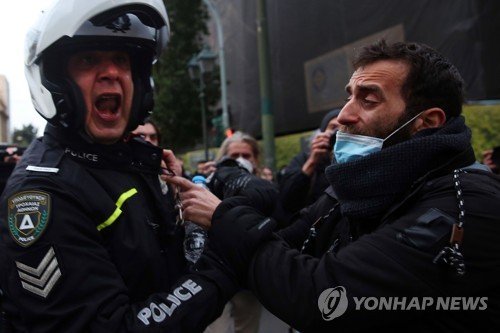 GREECE PROTEST 17 NOVEMBER KOUFONTINAS SUPPORTERS : 네이트 뉴스