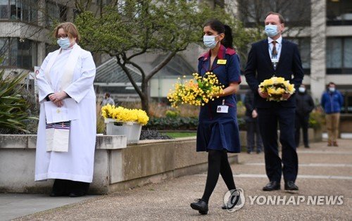 BRITAIN PANDEMIC CORONAVIRUS ONE YEAR LOCKDOWN : 네이트 뉴스