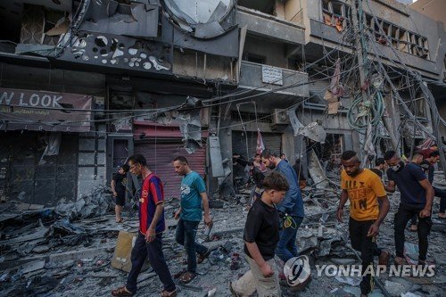 MIDEAST ISRAEL PALESTINIAN ISRAELI STRIKE AL-SHOROUQ BUILDING : 네이트 뉴스
