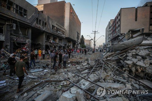 MIDEAST ISRAEL PALESTINIAN ISRAELI STRIKE AL-SHOROUQ BUILDING : 네이트 뉴스