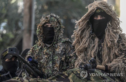 MIDEAST ISRAEL PALESTINIAN FIGHTERS (PIJ) MARCH IN GAZA : 네이트 뉴스