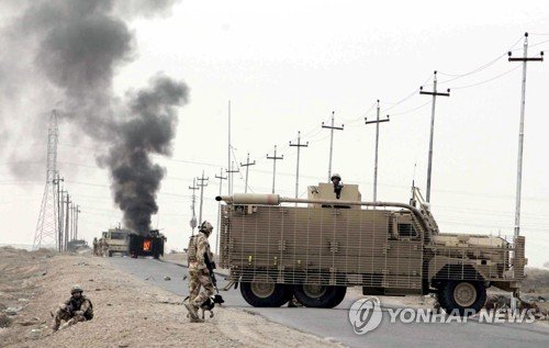 (FILE) IRAQ PHOTO SET INVASION 20TH ANNIVERSARY : 네이트 뉴스