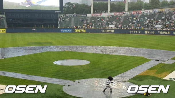 '범바오' 천재타자, 우천 세리머니 팬 서비스…기우뚱, 슬라이딩 '환호성 폭발' : 네이트 스포츠