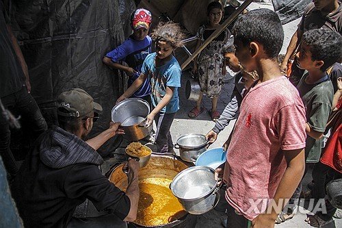 MIDEAST-GAZA-JABALIA-FOOD RELIEF : 네이트 뉴스