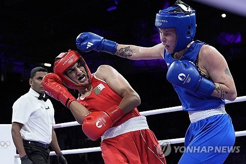 'XY염색체' 복서 메달 확보 성공…여자 66kg급 4강행→IOC "명확하게 여성" 강조 [2024 파리] : 네이트 스포츠
