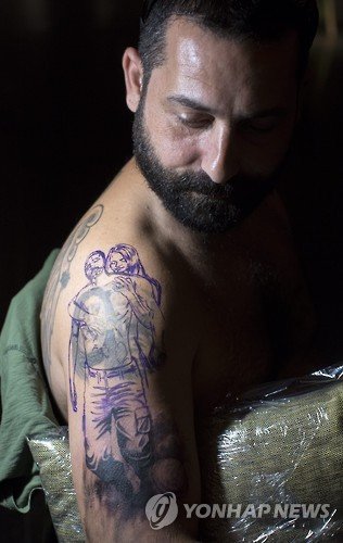 ISRAEL TATTOOS ON TERROR VICTIMS AND SOLDIERS : 네이트 뉴스