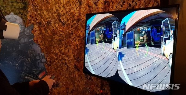KT VR기기 쓰고 '스페셜포스' 해보니…'머리가 핑~어지럼증' : 네이트 뉴스